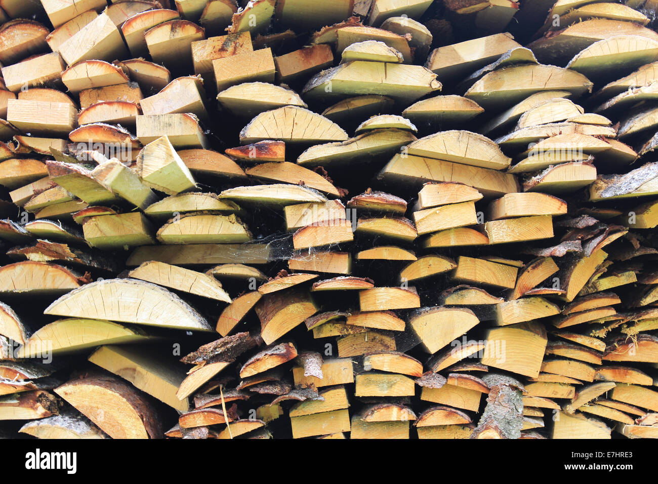 Stacked firewood in a pile Stock Photo - Alamy