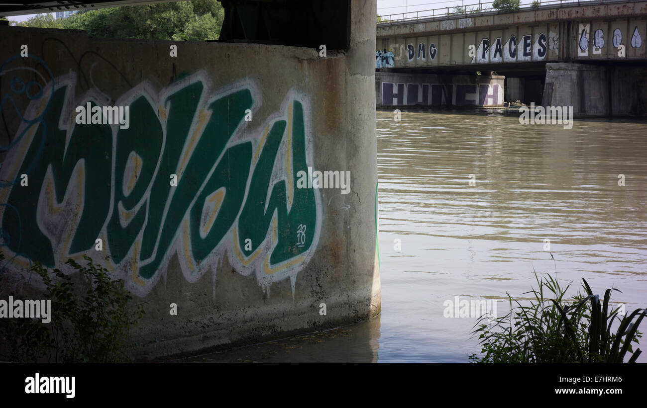 River bridge with graffiti Stock Photo - Alamy