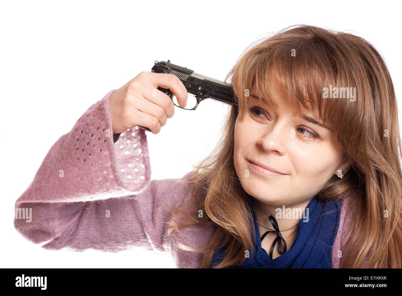 Beautiful young woman with gun isolated on white background Stock Photo ...