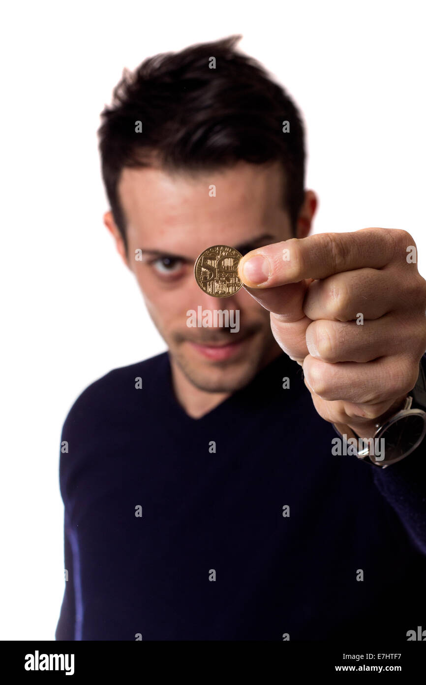 Young man showing a romanian coin isolated on white background Stock ...