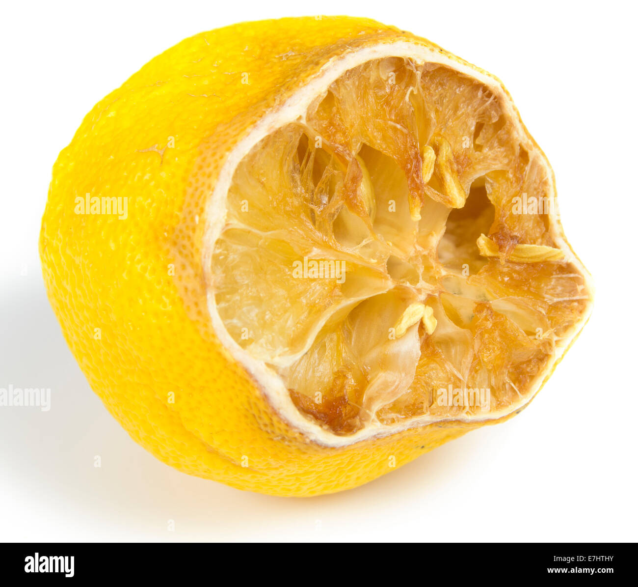 Rotten lemon isolated over white background Stock Photo - Alamy