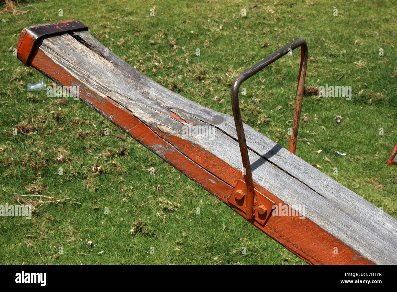 A wooden see saw seat in a children's playground in Cotacachi, Ecuador ...