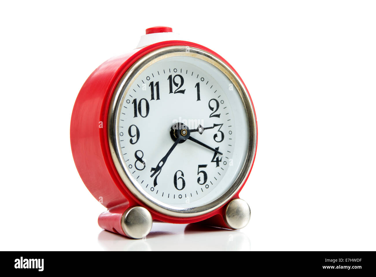 Red alarm clock isolated on white background Stock Photo - Alamy