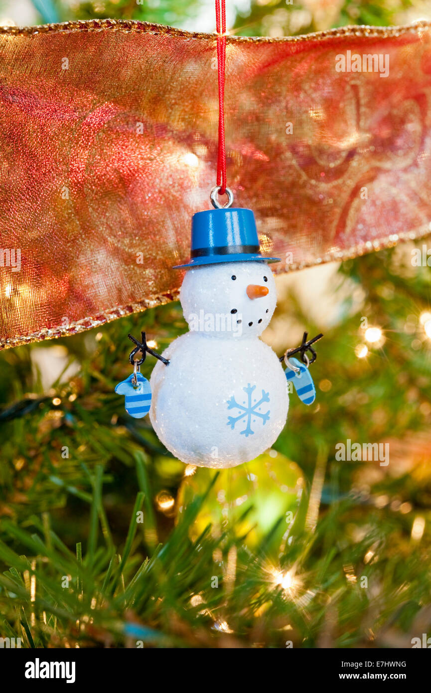 Snowman on a tree hi-res stock photography and images - Alamy