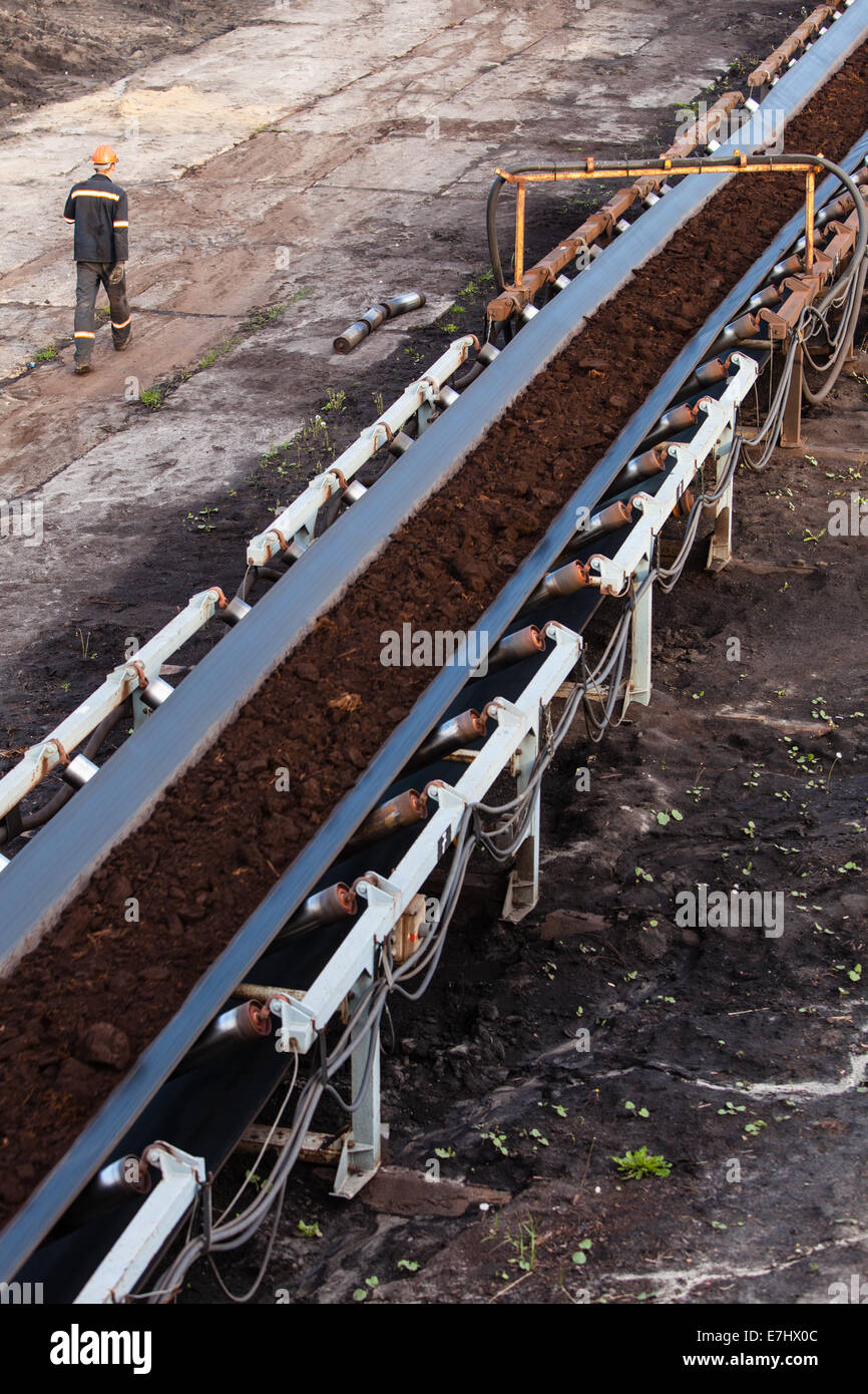 Open pit. Opencast brown coal mine. Belt conveyor as industrial detail ...