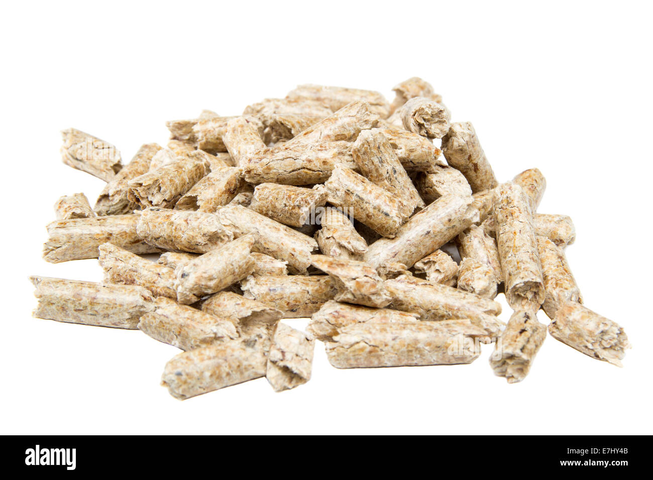 Pile of wood pellets isolated on white background Stock Photo - Alamy