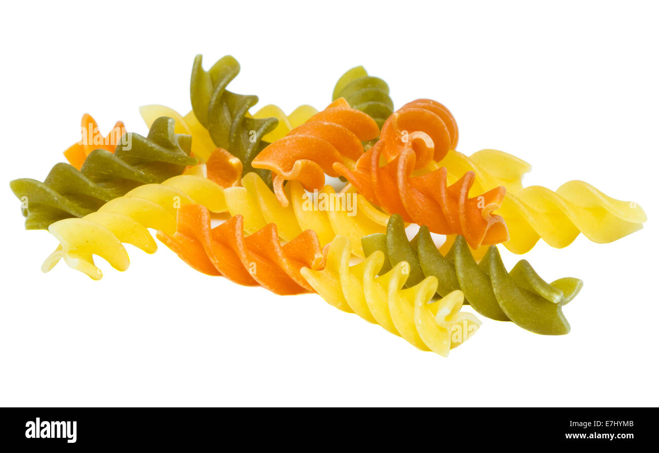 Raw color pasta isolated on white background Stock Photo - Alamy