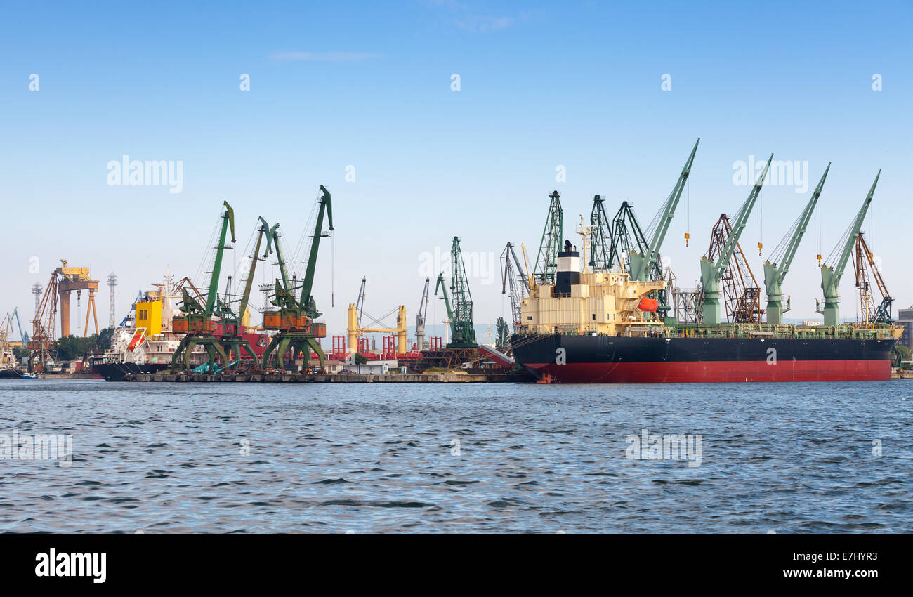 Industrial cargo ship is loading in port of Varna, Bulgaria Stock Photo ...