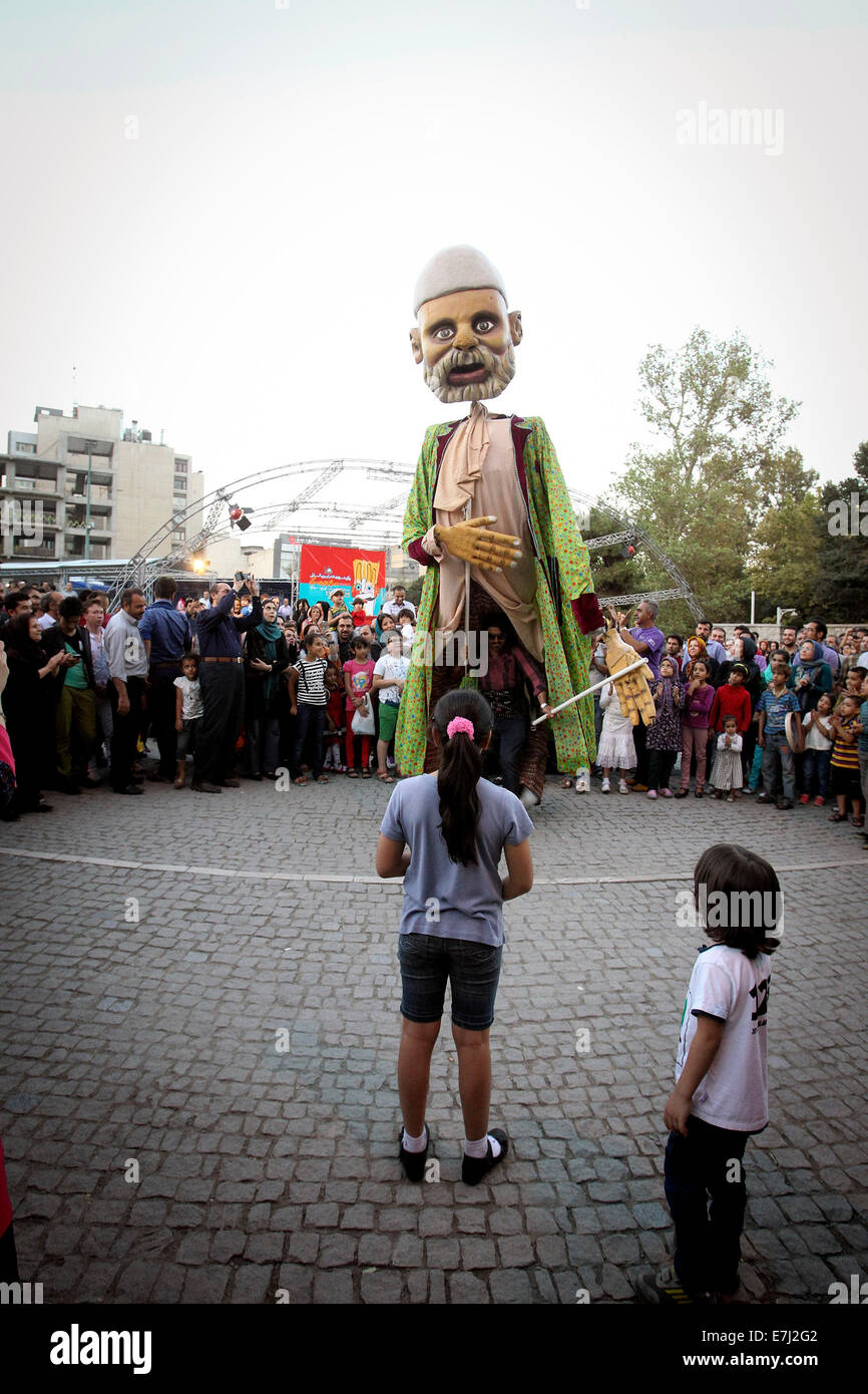 Tehran, Iran. 18th Sep, 2014. An Iranian actor performs a puppet show ...