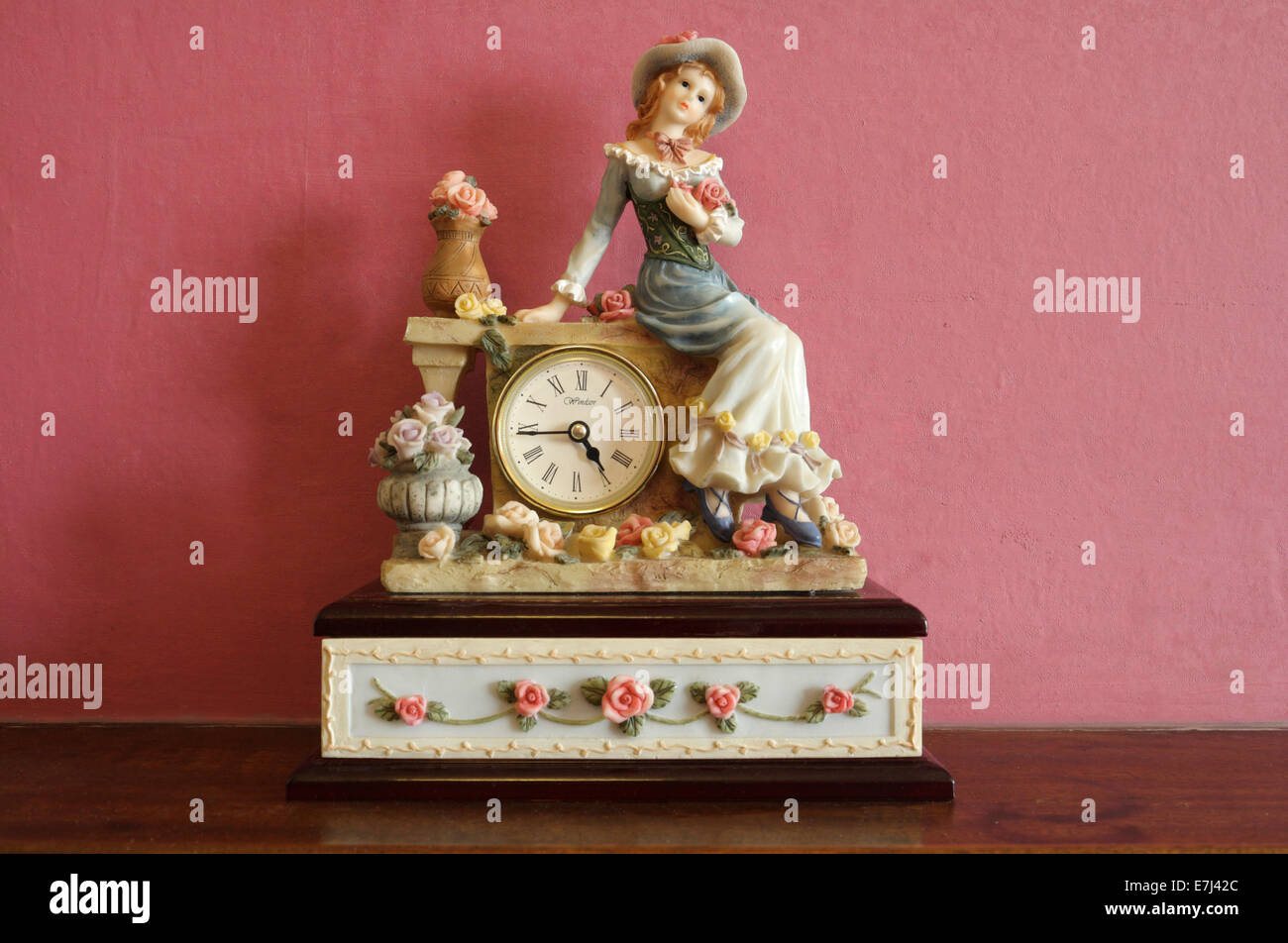 Ornate figurine Mantel clock Stock Photo - Alamy