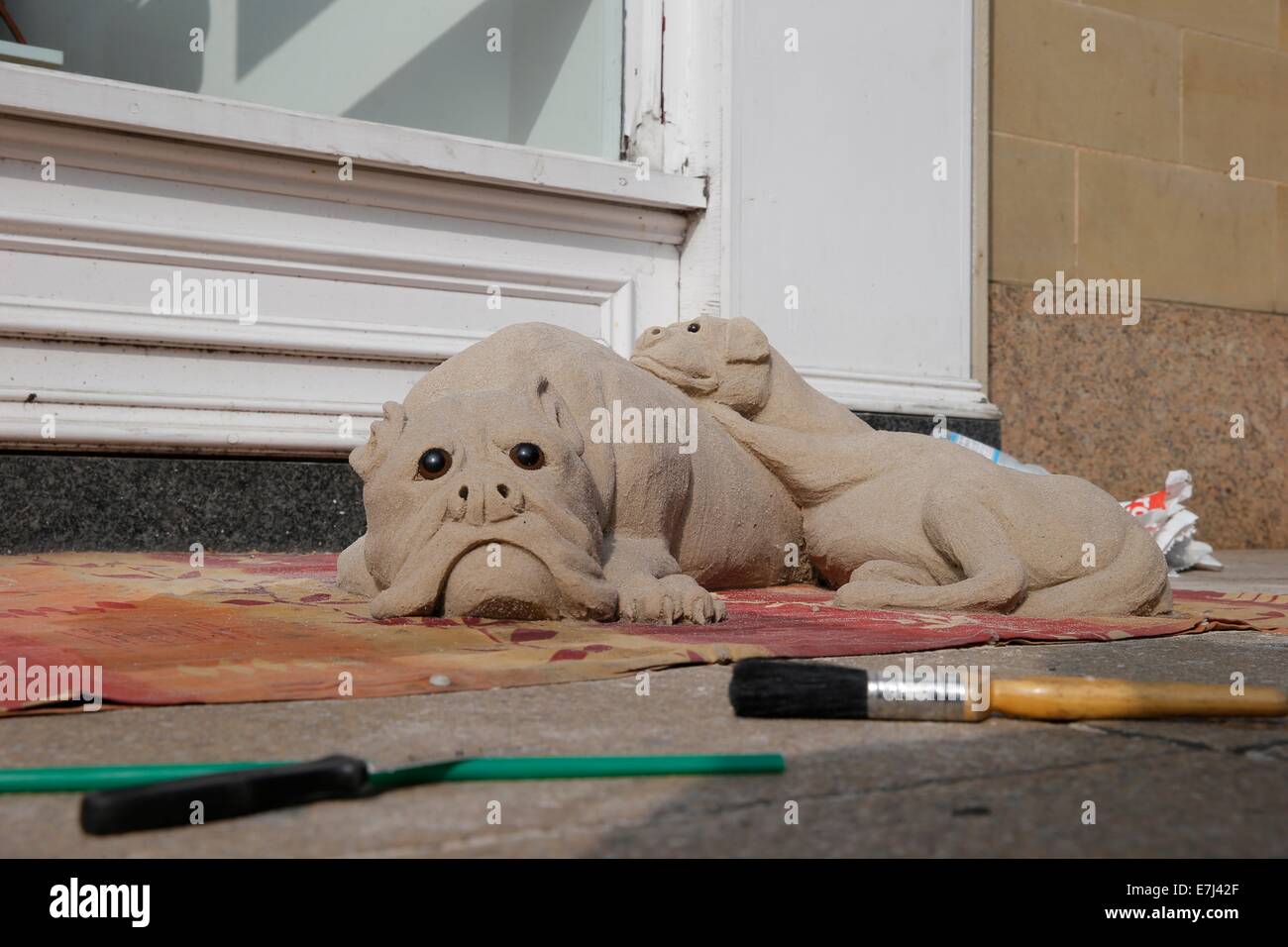 Dog sand carving hi-res stock photography and images - Alamy
