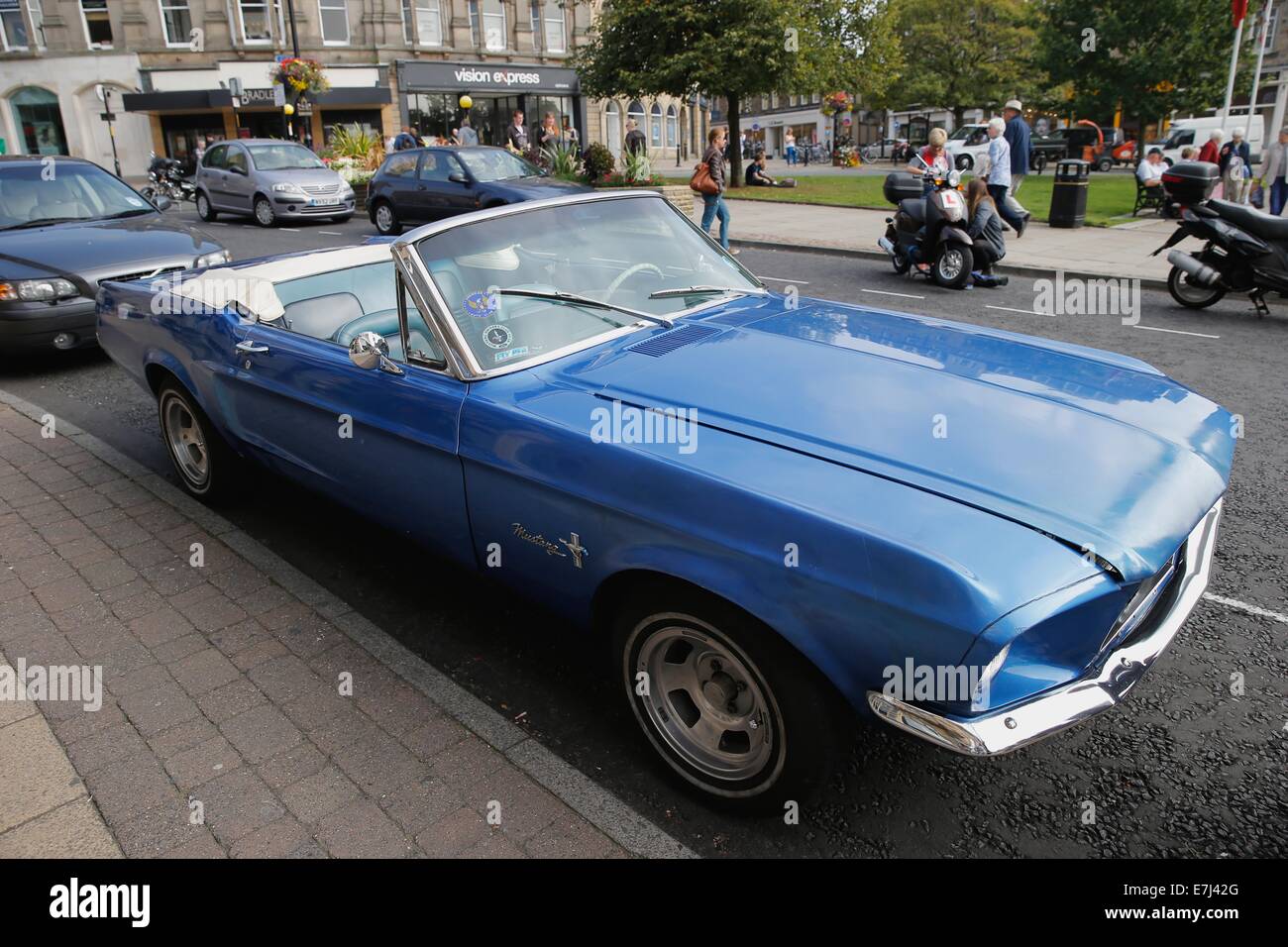 Proud man with his vintage blue Ford Mustang car in Harrogate Stock ...