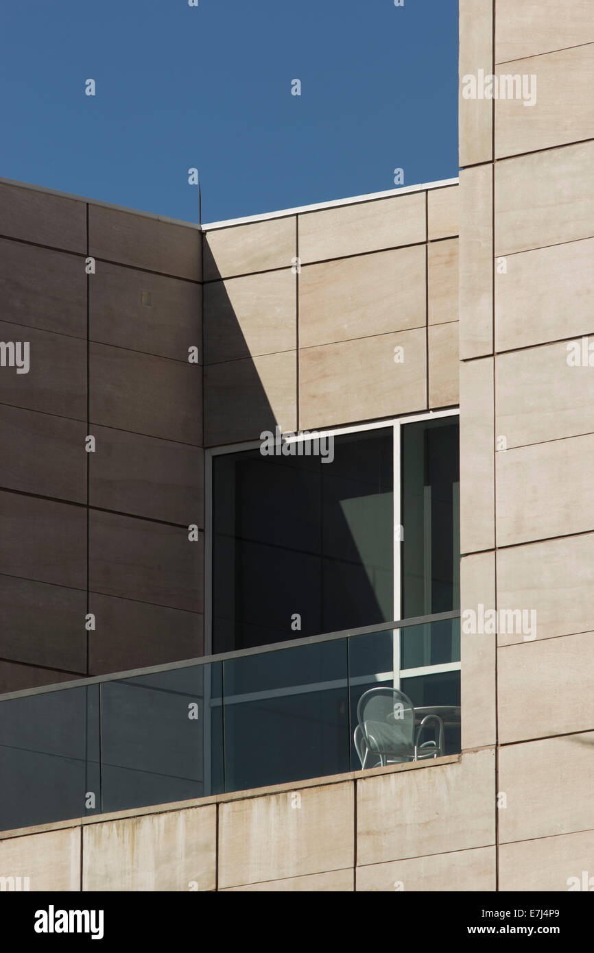 A sitting are on a balcony of an office building Stock Photo - Alamy