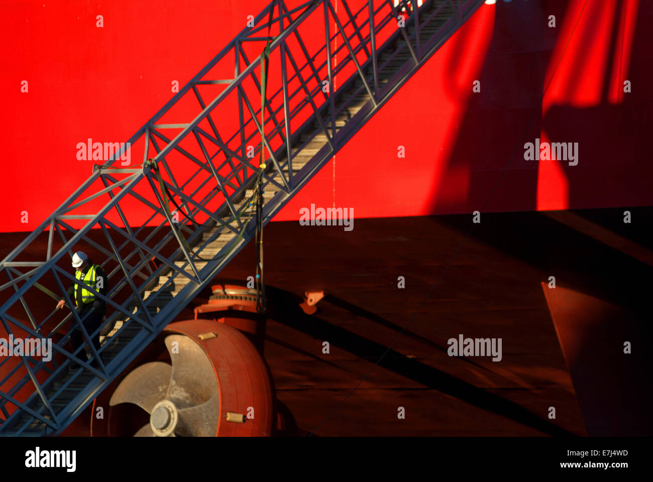Crew leaving red ship / Gangway Stock Photo - Alamy