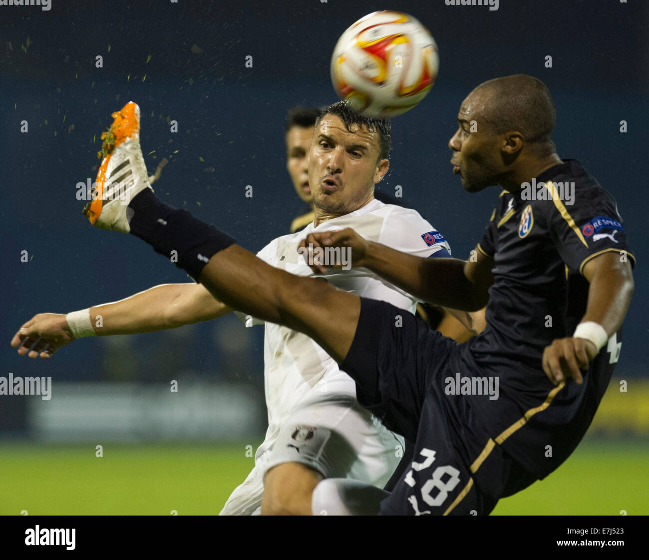 Zagreb, Croatia. 18th Sep, 2014. Josip Simunic (R) of Dinamo Zagreb ...