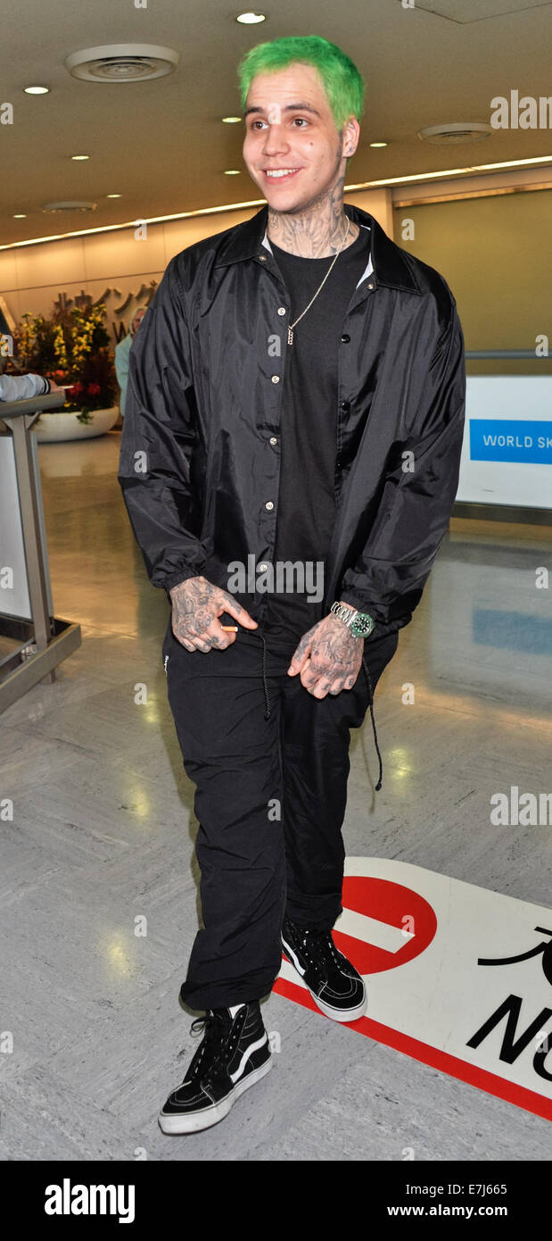 Tokyo, Japan. 19th Sep, 2014. Rapper Richard Hilfiger arrives at Narita ...