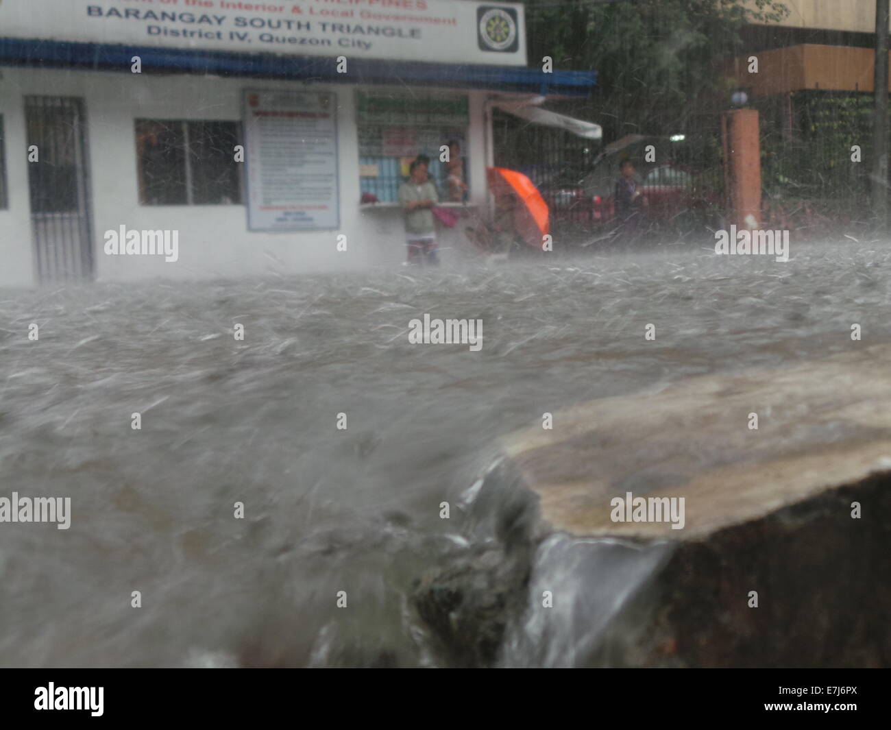 Typhoon Mario caused flooding in Quezon City as its estimated rainfall ...