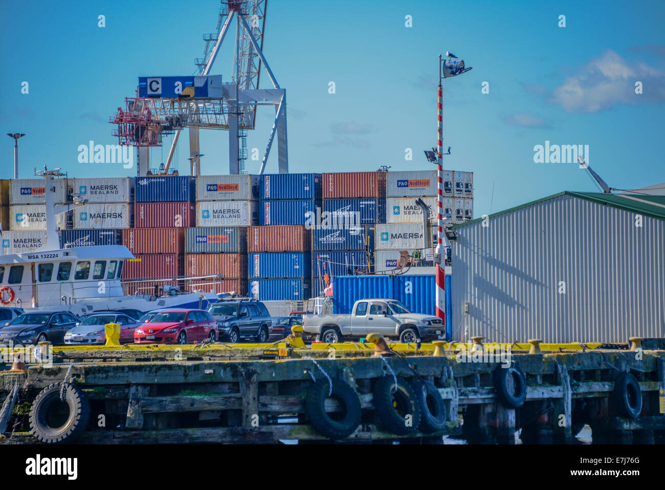 containers on docks stacked with crane Stock Photo - Alamy