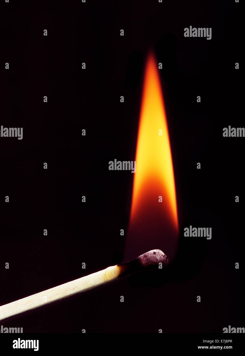 burning matchstick on black background Stock Photo - Alamy