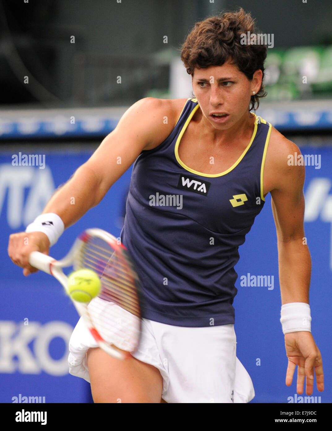 Tokyo, Japan. 19th Sep, 2014. Carla Suarez Navarro of Spain hits a ...