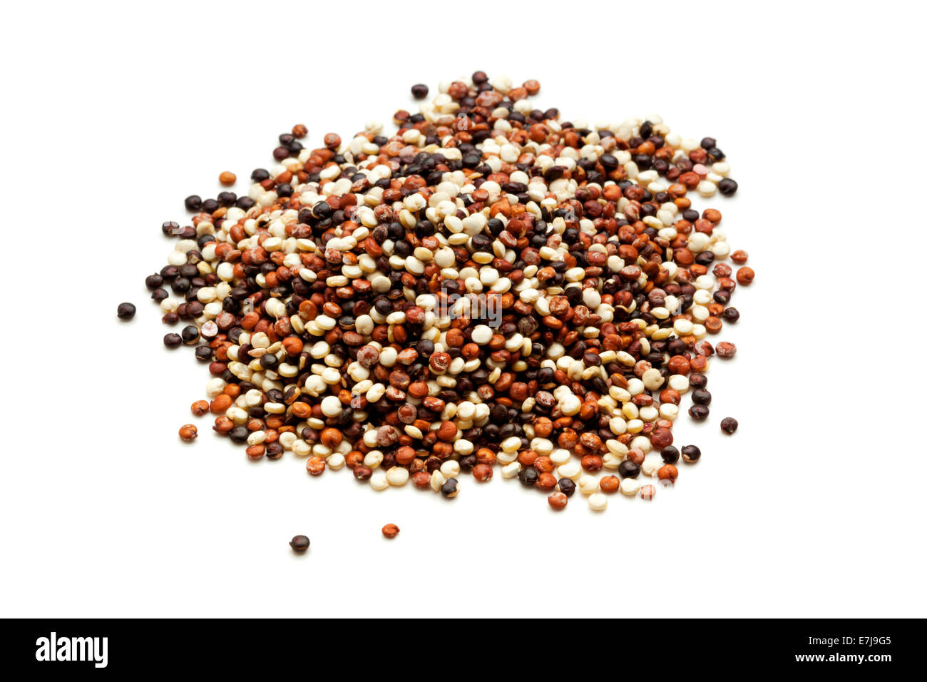 heap of quinoa grains isolated on white background Stock Photo - Alamy