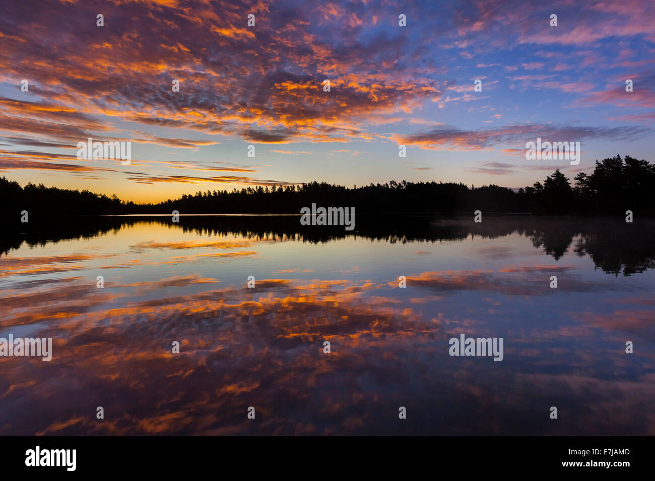 Sunrise at a lake, near Ed, Dalsland, Västra Götaland, Sweden Stock ...