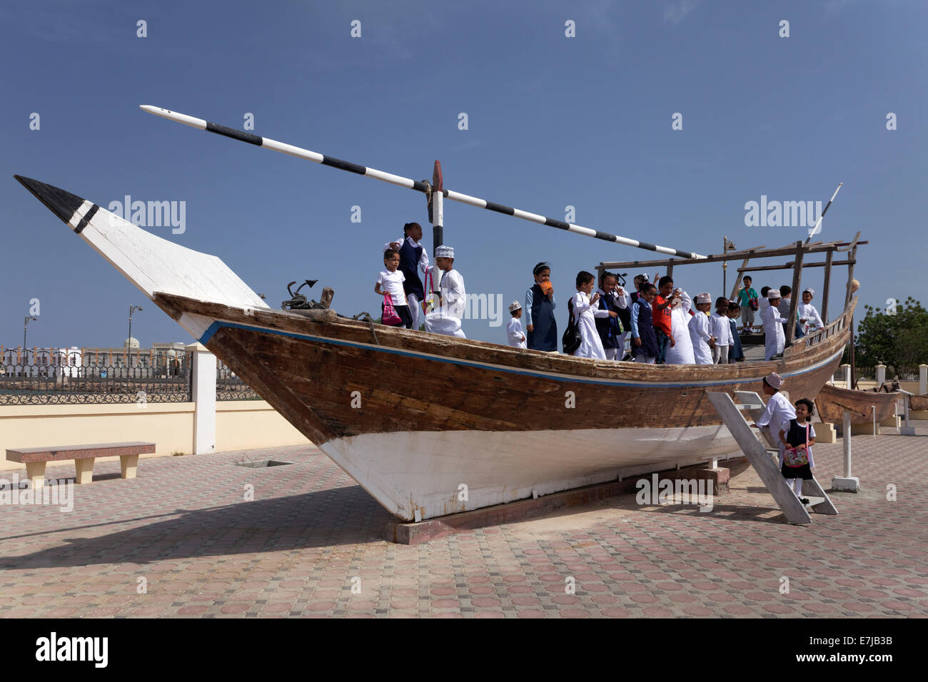 Children playing on a dhow-ship in the Dhow Museum, Sur, Ash Sharqiyah ...
