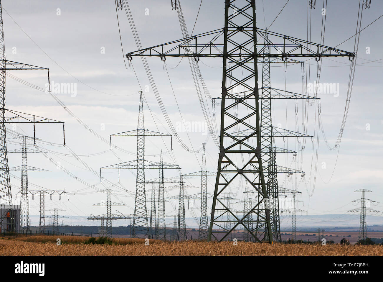 Newly erected high-voltage pylons of the South-West Interconnector of ...