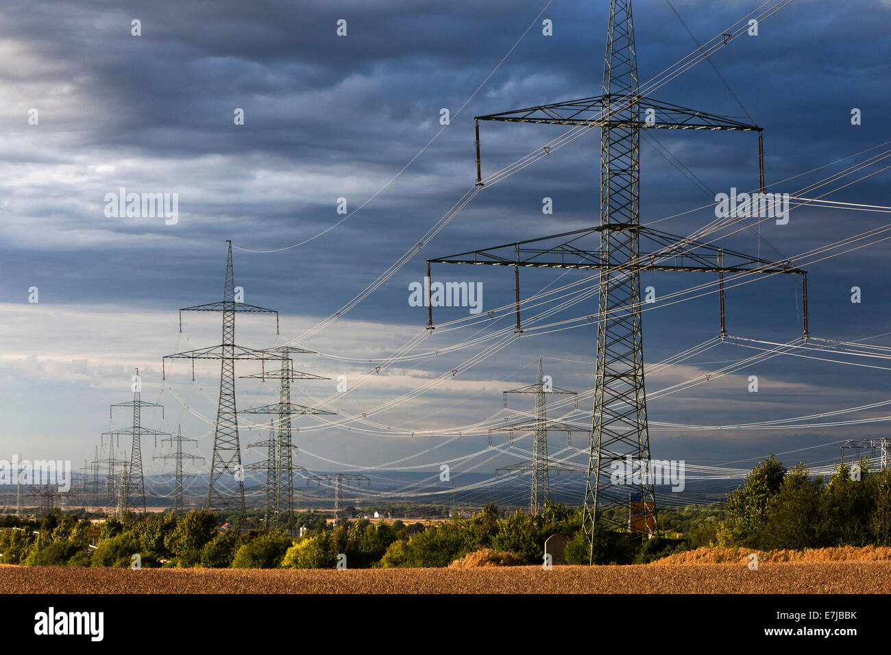 Newly erected high-voltage pylons of the South-West Interconnector of ...