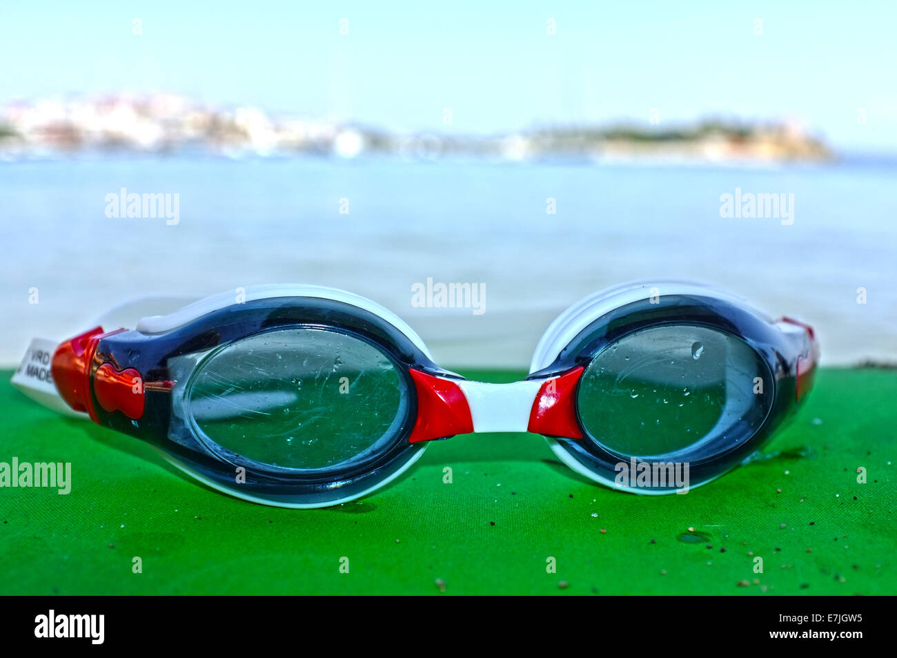 Blue goggles by the sea Stock Photo - Alamy