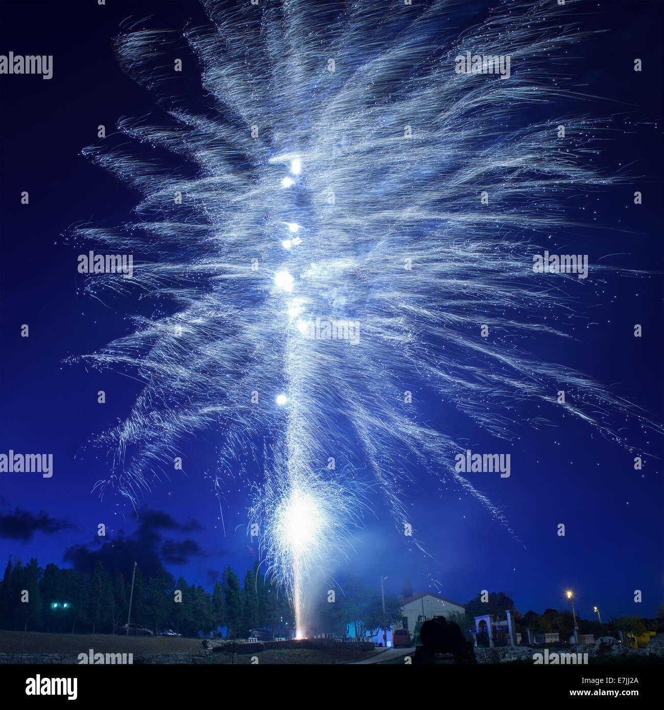 Blue colorful fireworks on night sky background Stock Photo - Alamy