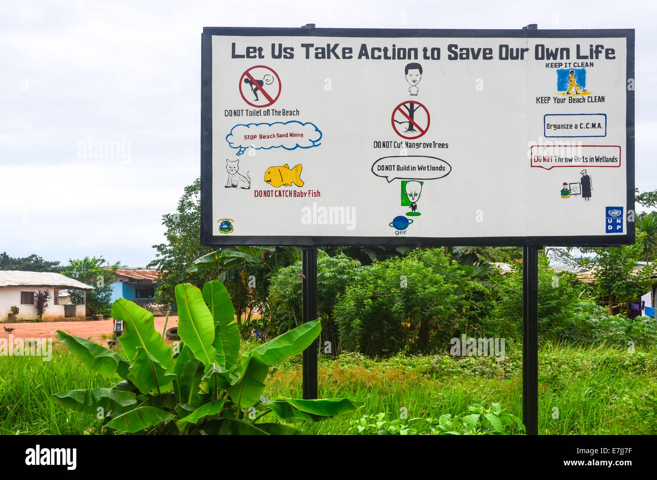 A sign about health and hygiene reading "Let us take action to save our ...