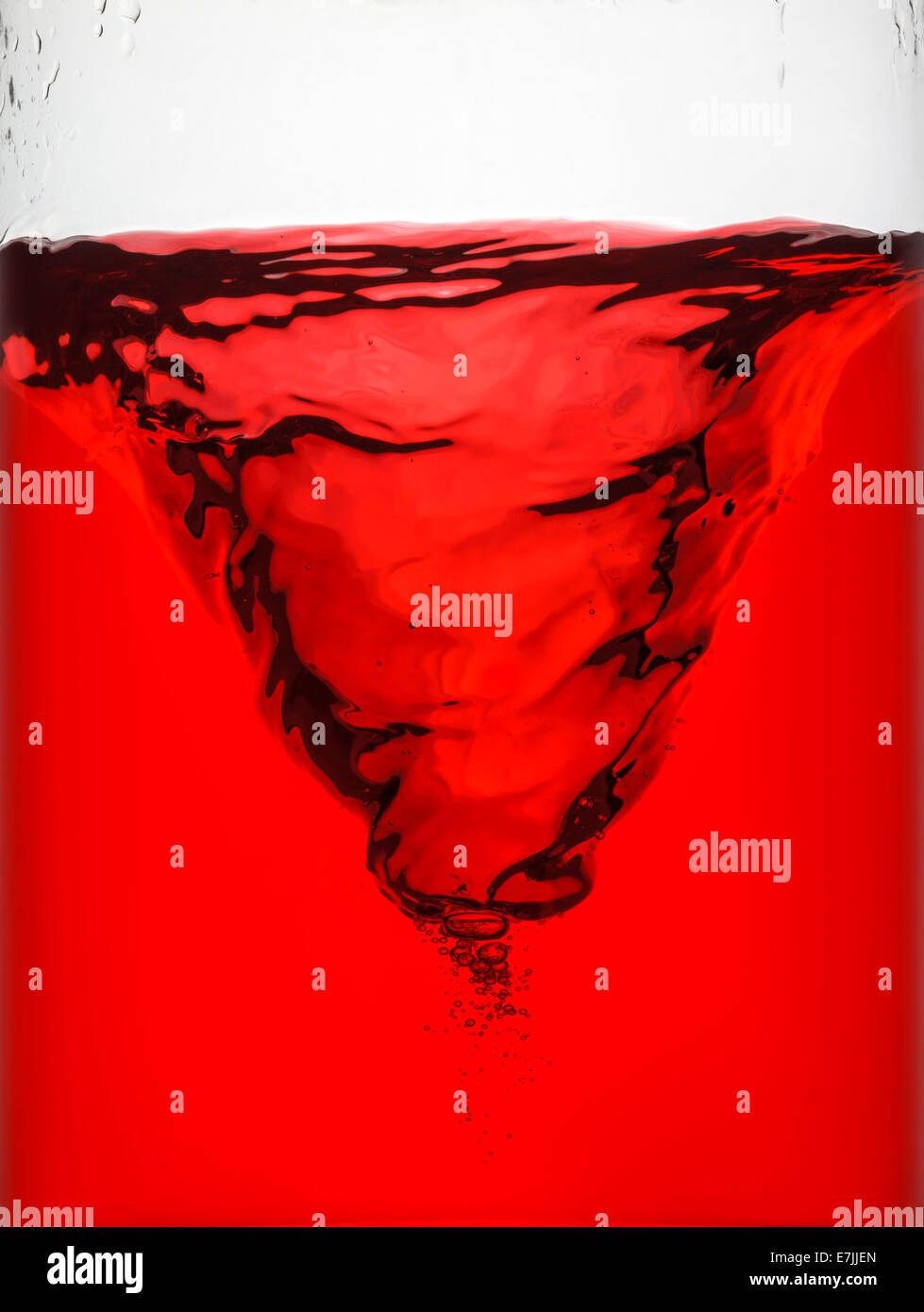 swirl of red liquid small typhoon Stock Photo - Alamy