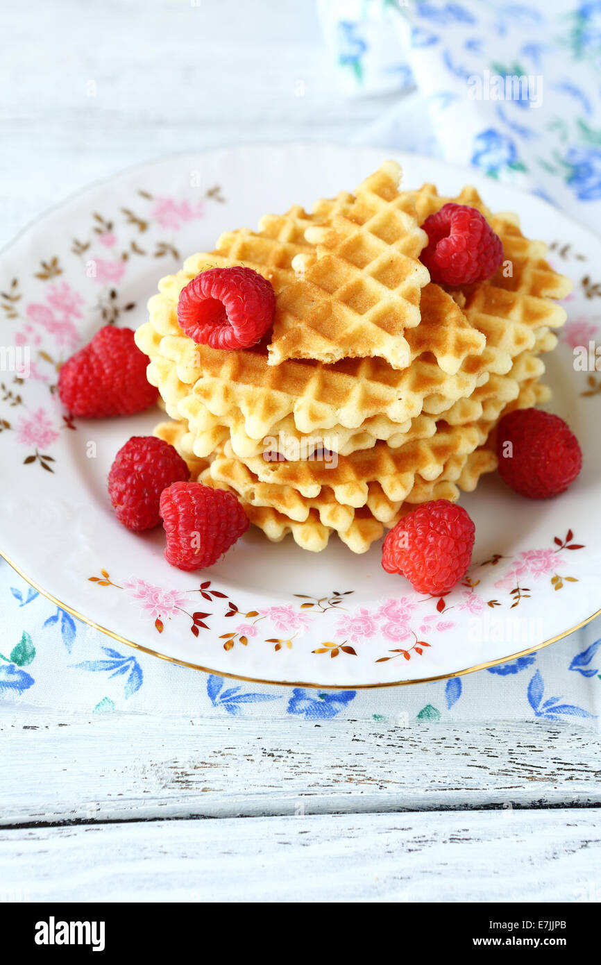Stack of crispy waffles with raspberries, closeup Stock Photo - Alamy