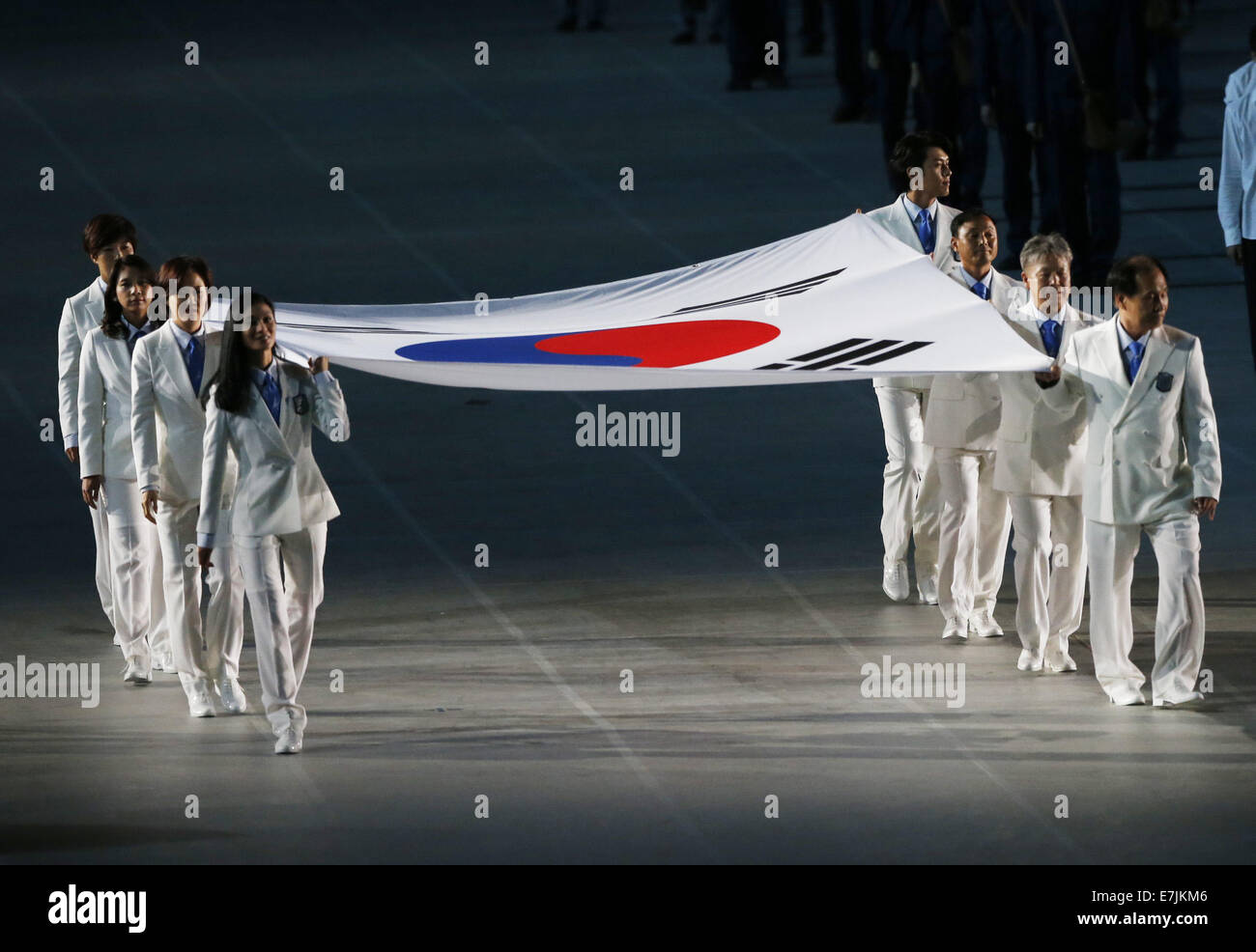 Incheon, South Korea. 19th Sep, 2014. Flag bearers carry the national ...