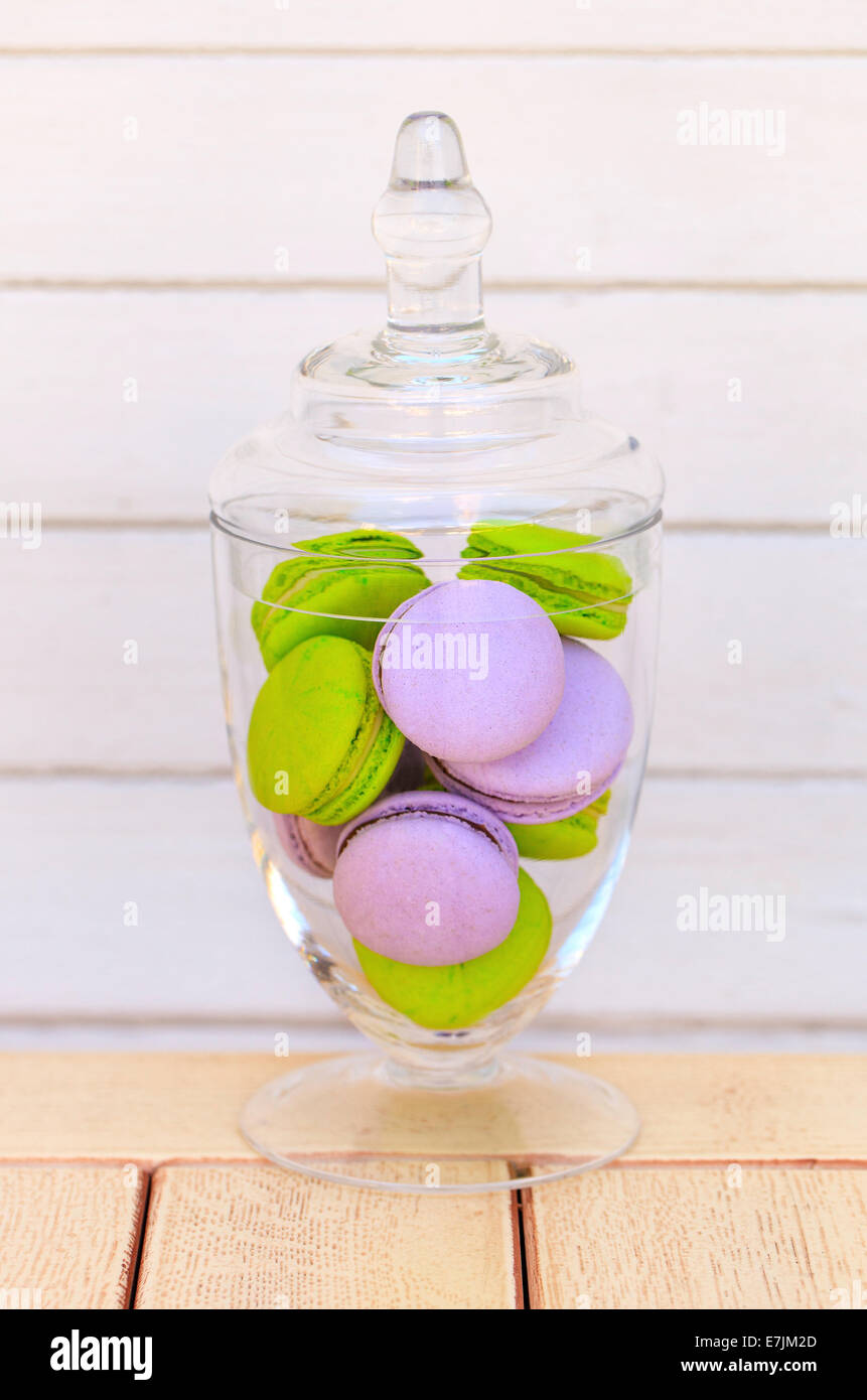 Delicious sweet buffet with colorful glass bowl of macarons Stock Photo ...