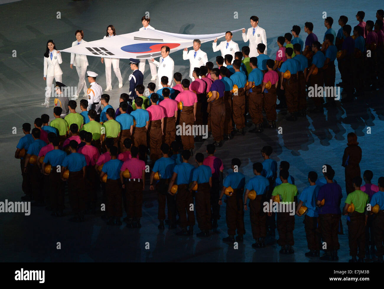 Incheon, South Korea. 19th Sep, 2014. Flag bearers carry the national ...