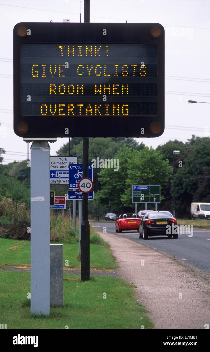 digital roadside sign by cycle route warning drivers to give cyclists ...