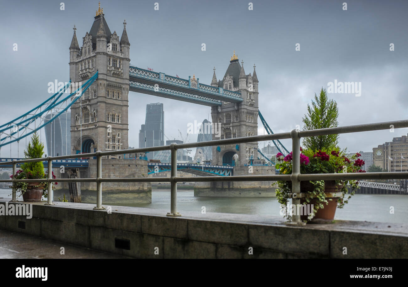 Rain falls on Tower Bridge as seen from the south side of the river ...