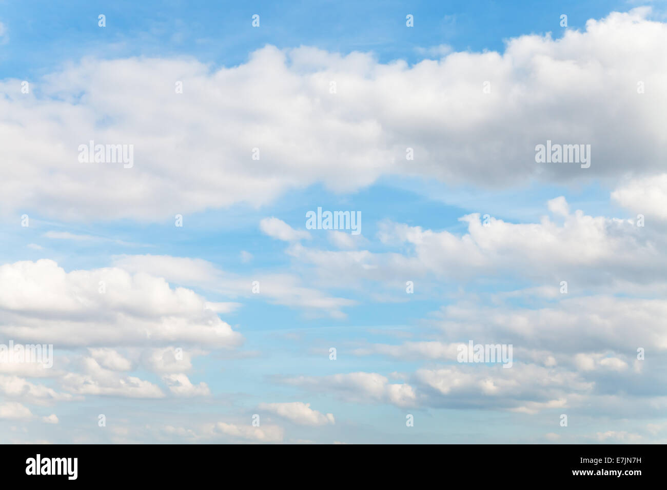 blue sky with layer of white clouds - natural background Stock Photo - Alamy