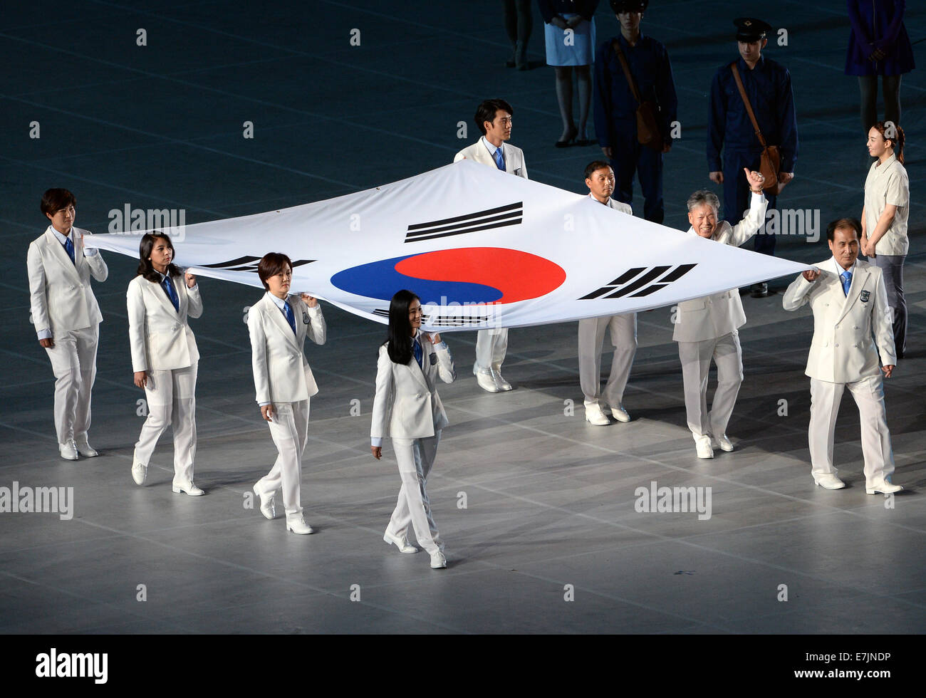 Incheon, South Korea. 19th Sep, 2014. Flag bearers carry the national ...