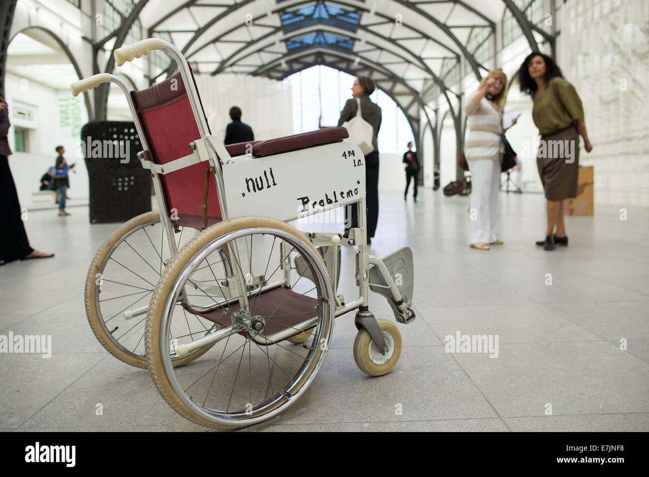 People walk through the exhibition by Mexican artist Mariana Castillo ...