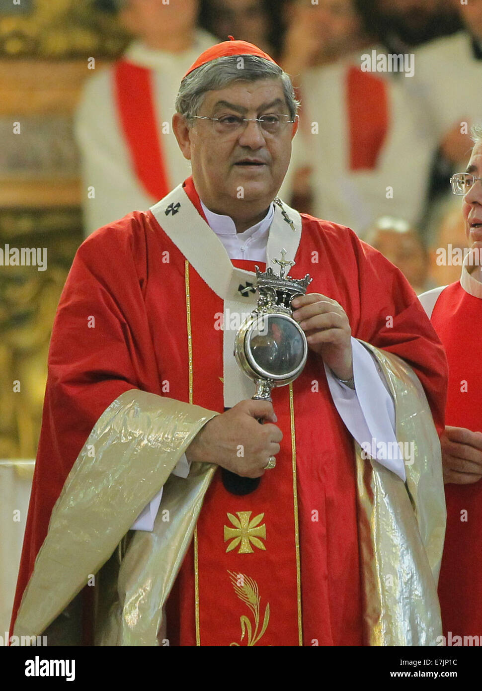 Cardinal Crescenzio Sepe , Archbishop of Naples holds a vial said to ...