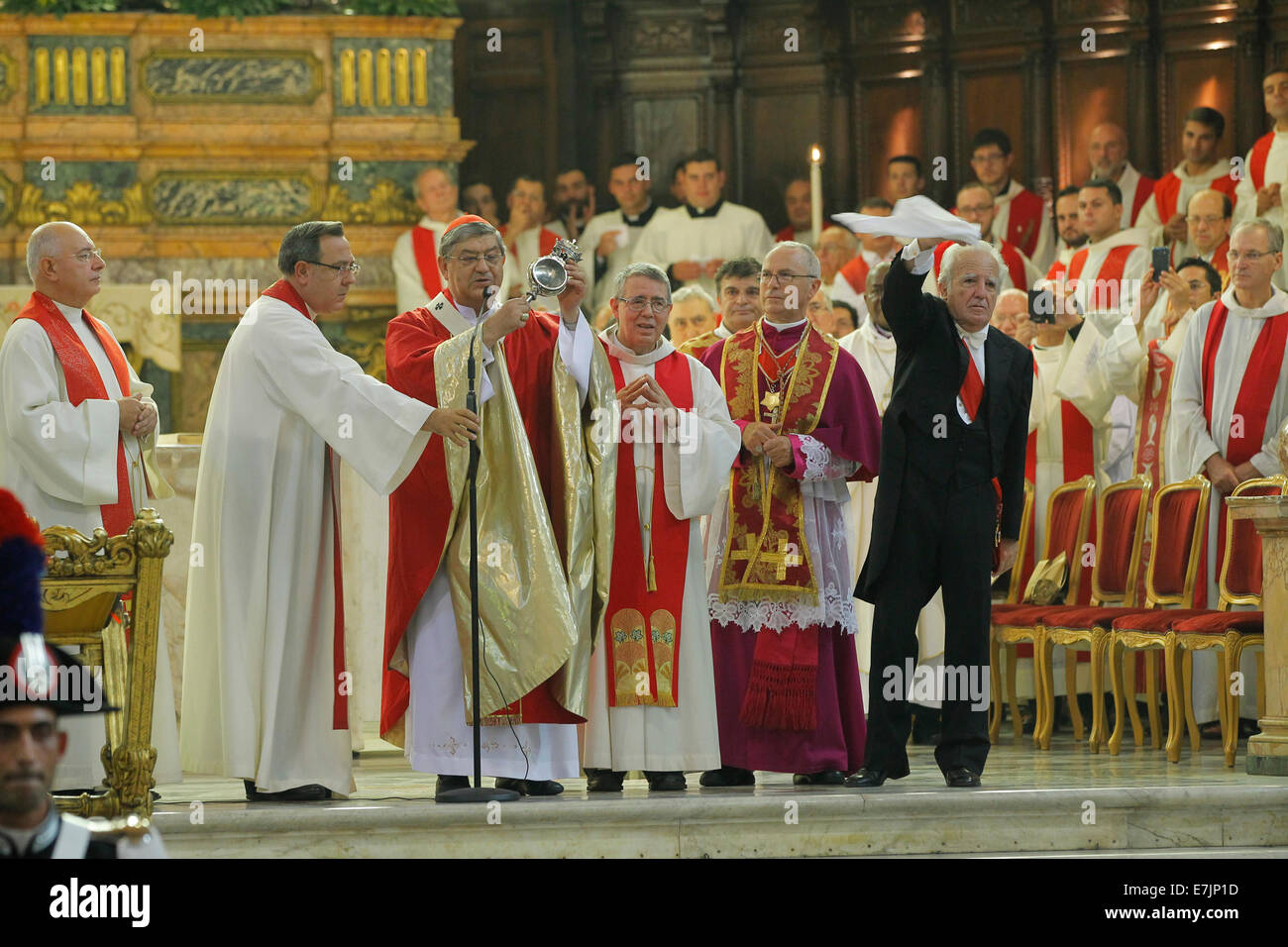 Cardinal Crescenzio Sepe , Archbishop of Naples holds a vial said to ...