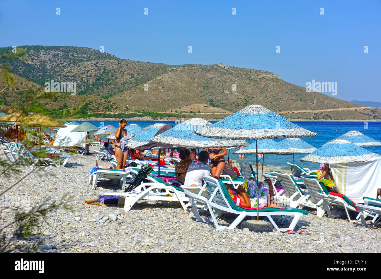 People on natural beach Stock Photo - Alamy