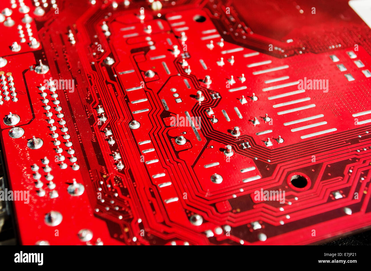 Closeup of a red printed circuit board Stock Photo - Alamy
