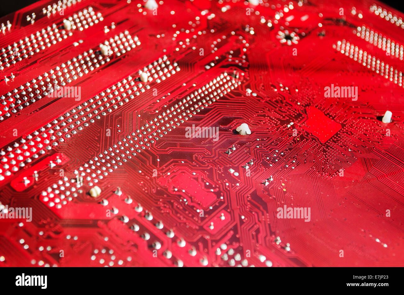 Closeup of a red printed circuit board Stock Photo - Alamy