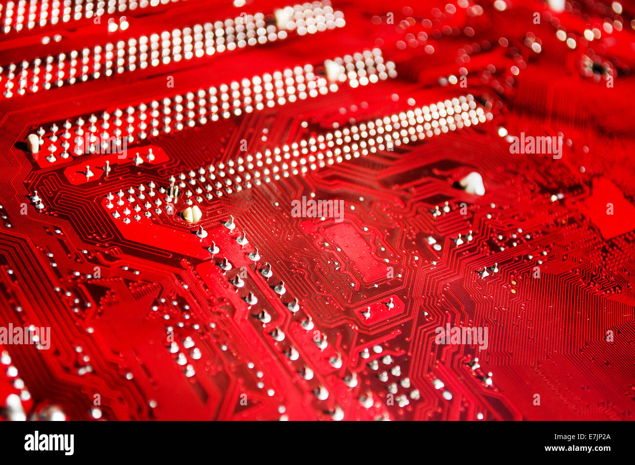 Closeup of a red printed circuit board Stock Photo - Alamy