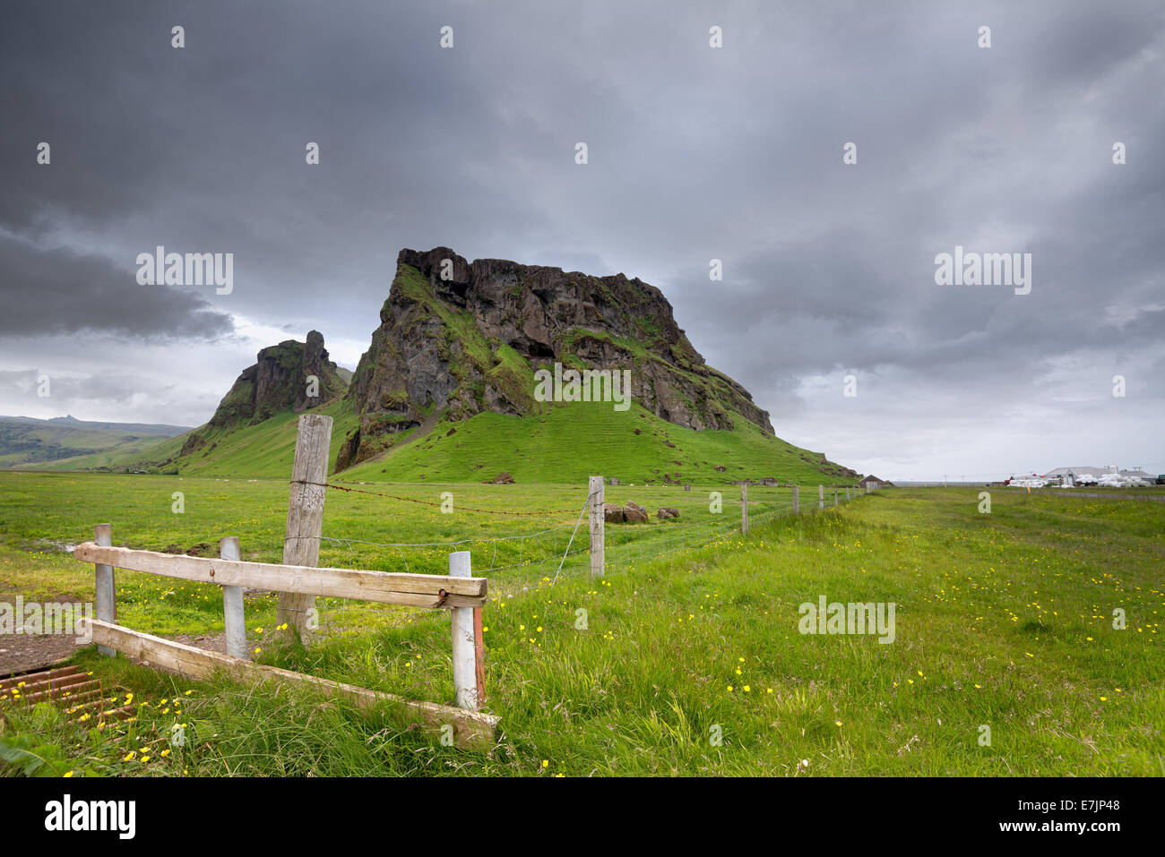 Beautiful landscape of Icelandic field with fence and mountain Stock ...