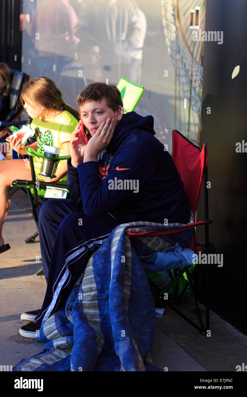 Littleton, Colorado USA. 19 Sept. 2014. Graham Rosenberg waits as first ...